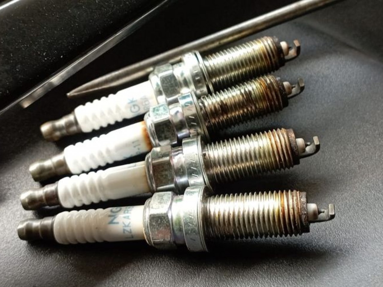 Setelah Motor Menerjang banjir, Apakah Perlu Ganti Busi